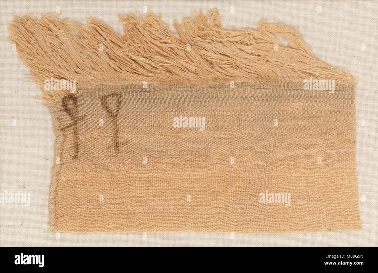 This linen mark in the MET collection displays a pattern or symbol on ...