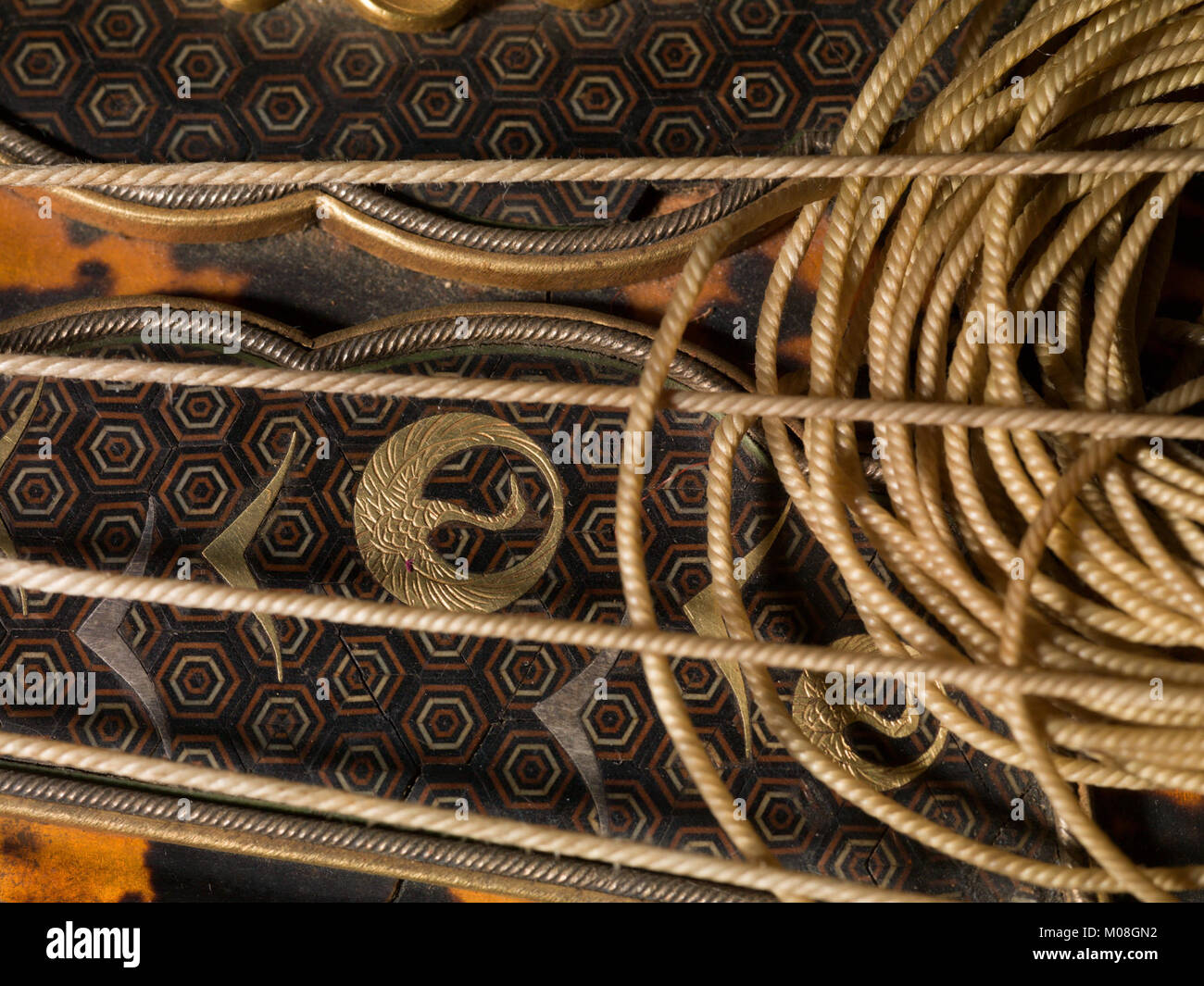 The Koto, a traditional Japanese stringed instrument, is known for its ...