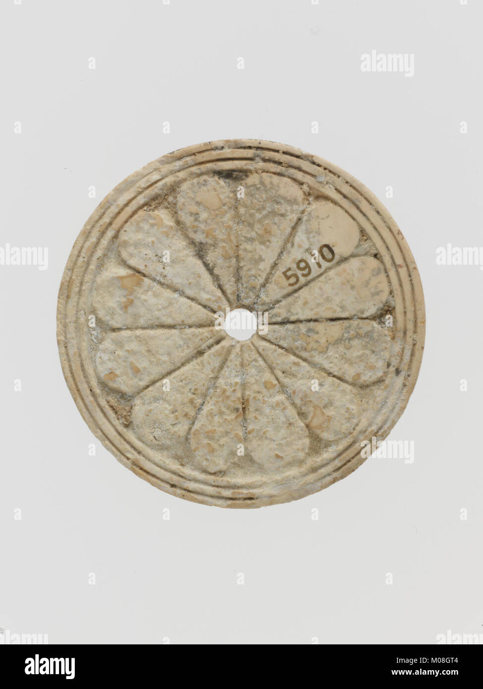 Ivory disk with rosette MET DP121301 Stock Photo - Alamy