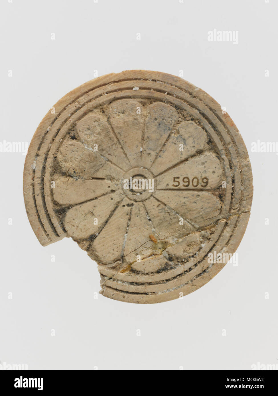 Ivory disk hi-res stock photography and images - Alamy