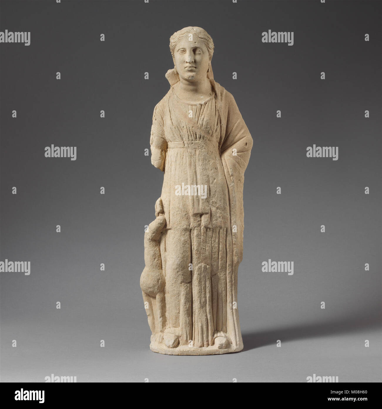 This limestone statuette depicts Artemis, the Greek goddess of the hunt ...