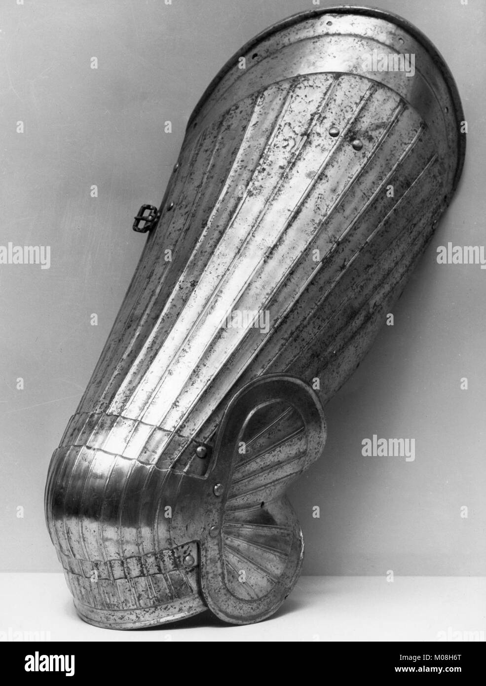 This piece of armor, including a left thigh defense (cuisse) and knee ...