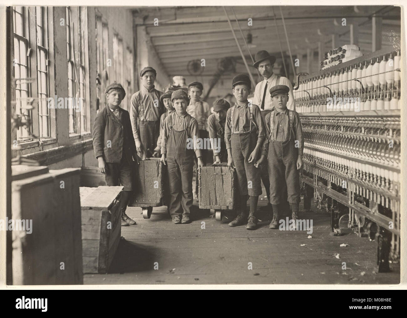 This photograph shows mill children in South Carolina working under ...