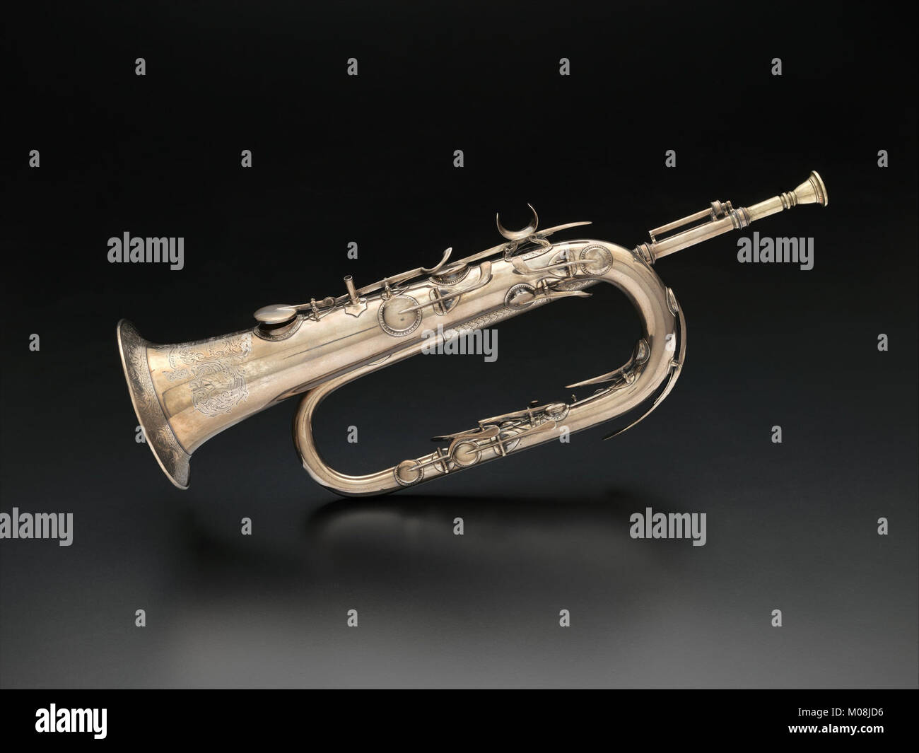A historic illustration of a keyed bugle, highlighting its design and ...