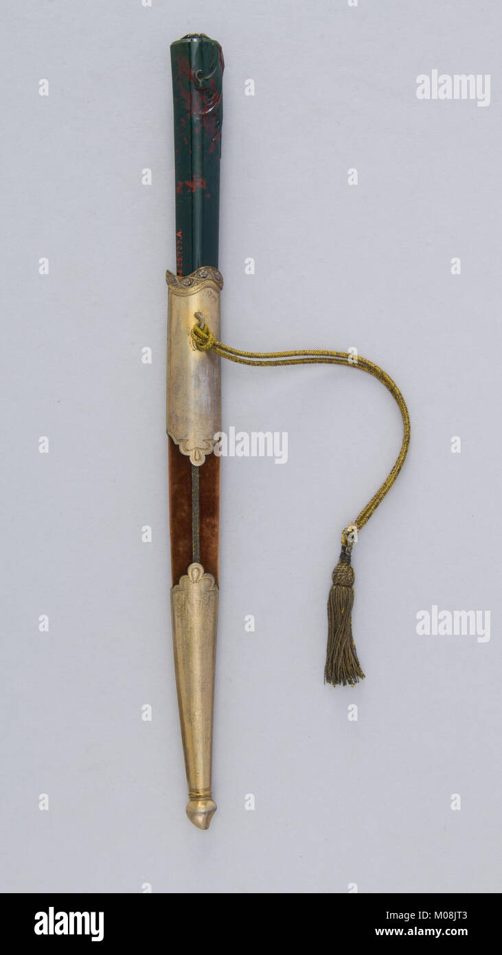 This Kard knife with sheath, from the Middle East, features a curved ...