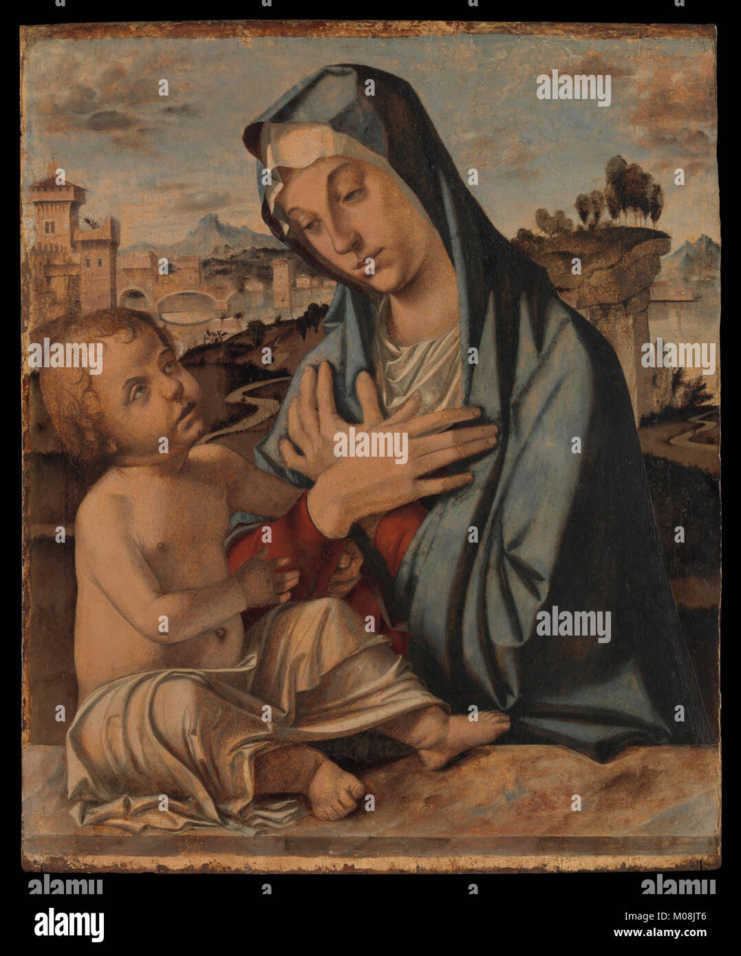 This artwork depicts the Madonna adoring the Child, reflecting ...