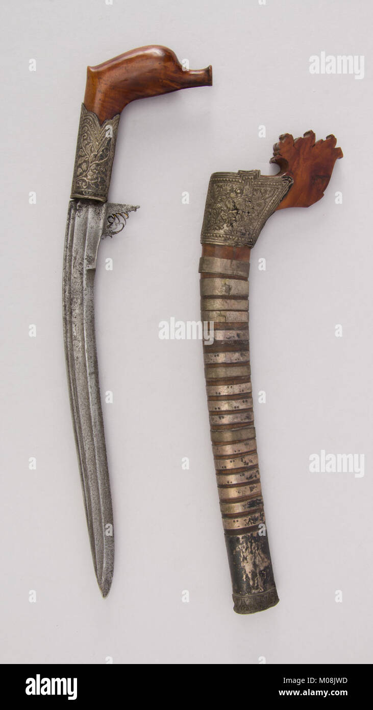 A Japanese sekin knife with finely crafted sheath and blade, reflecting ...