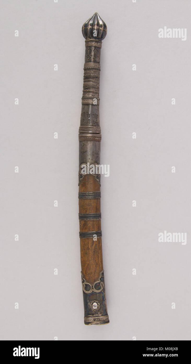 This Dha knife, with its sheath, originates from Southeast Asia. Known ...
