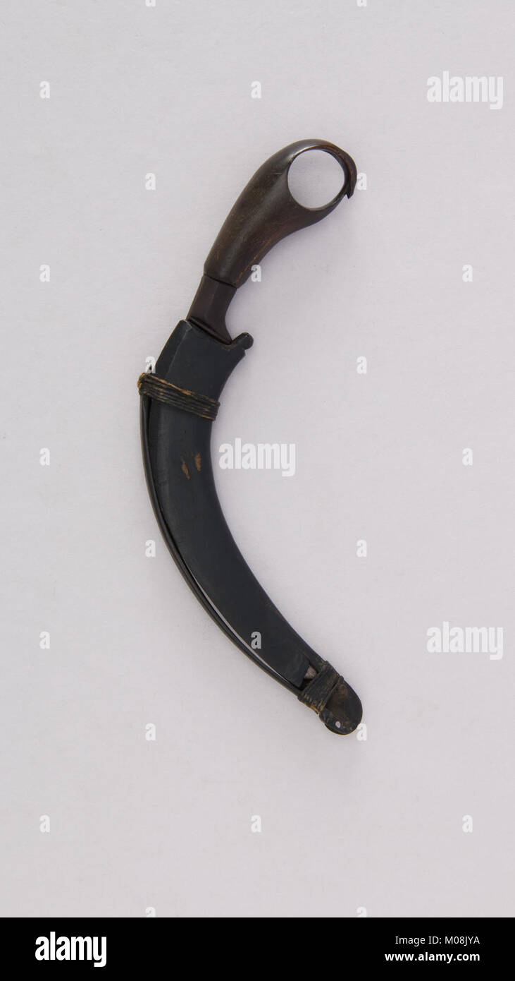 This Korambi knife with sheath represents traditional craftsmanship in ...