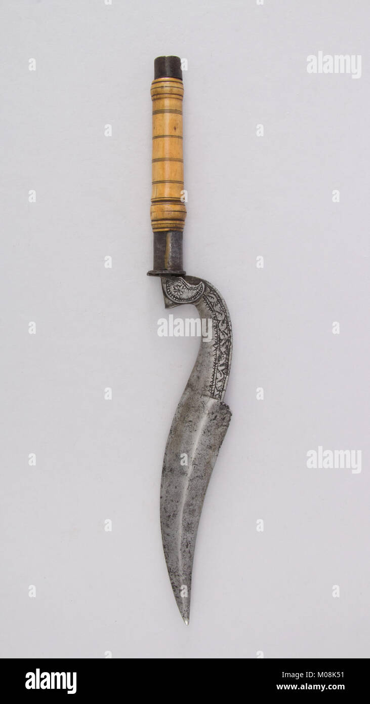 This knife, also known as a chopper, features a broad blade designed ...