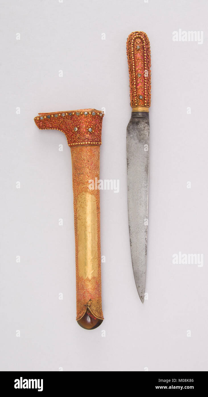 This knife with its sheath is an example of historical weaponry from ...