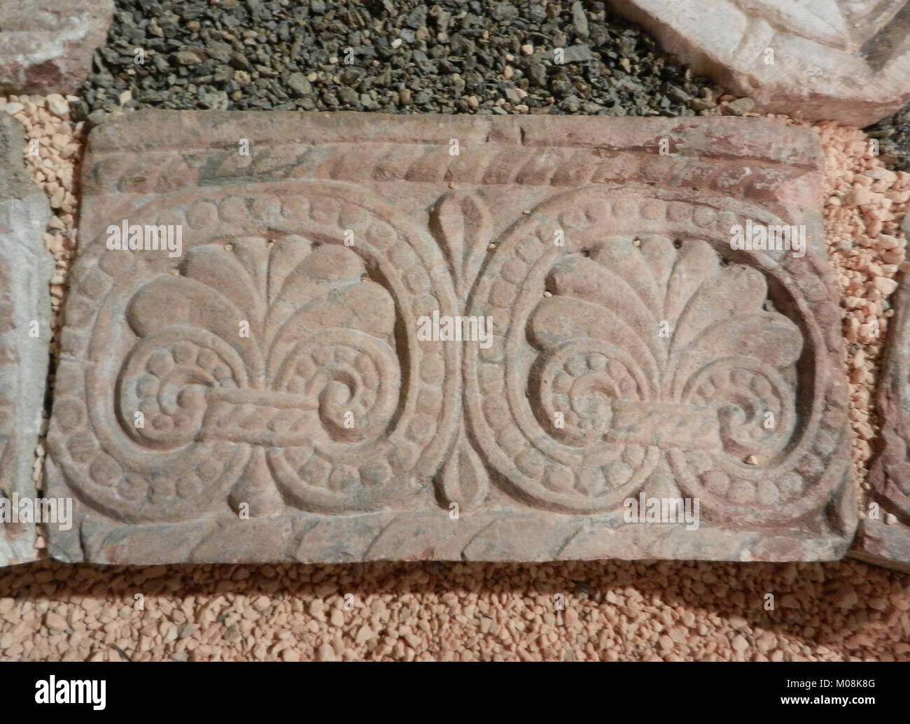 This lintel, part of an architectural structure, features intricate ...
