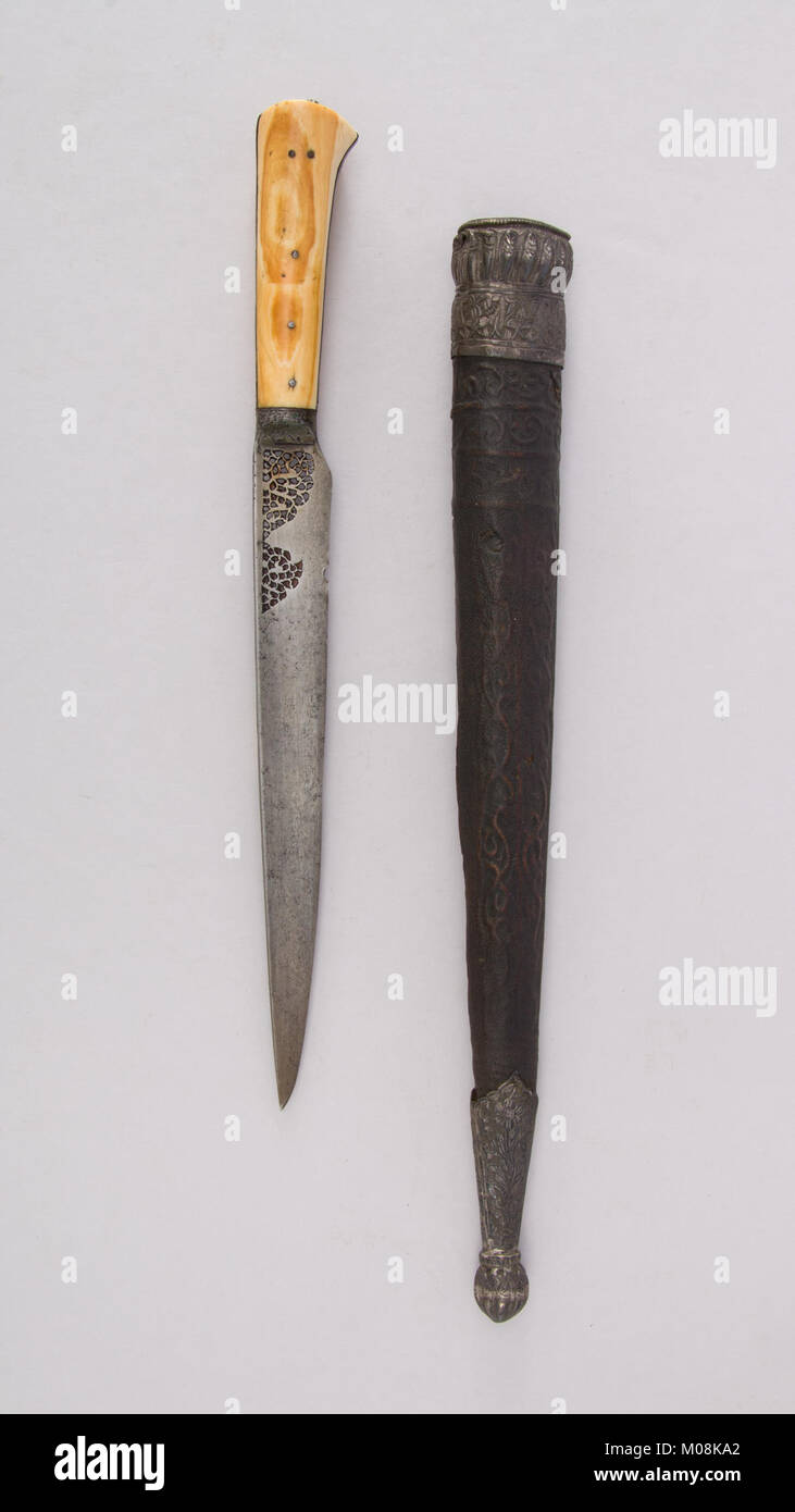 The Kard knife with a curved blade and sheath illustrates traditional ...