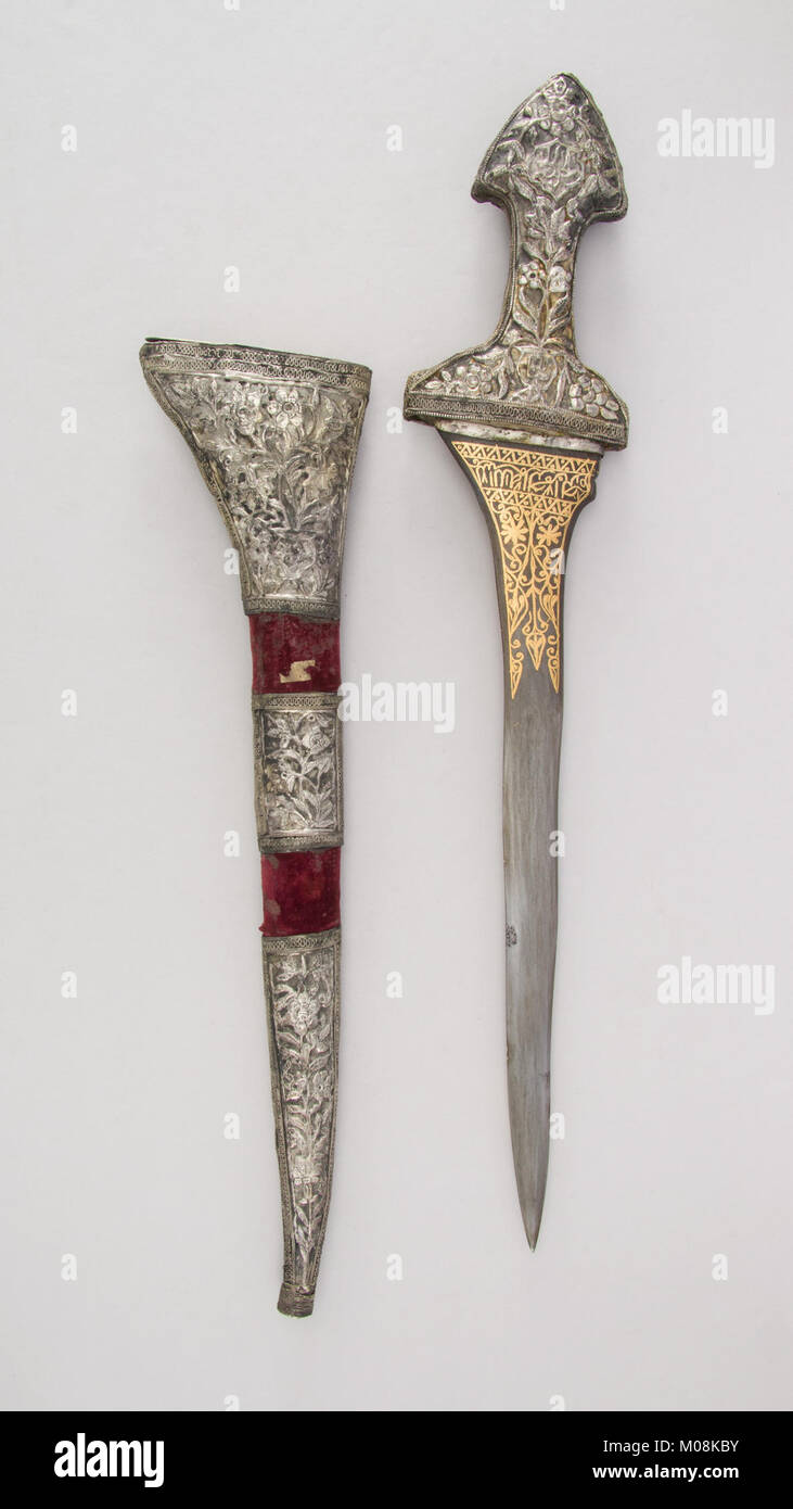 This Kris dagger with wavy blade and sheath exemplifies traditional ...