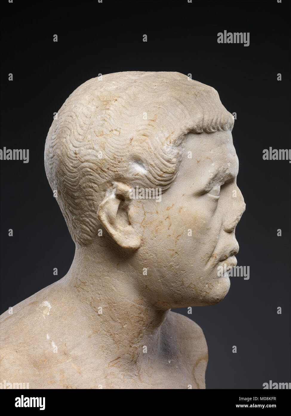 A marble portrait bust representing a man from antiquity, showcasing ...