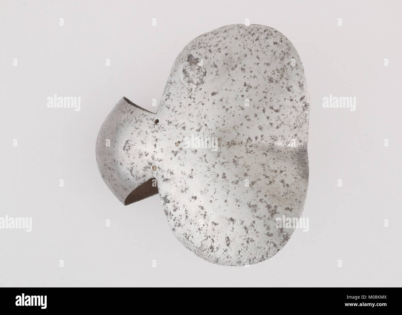 These medieval knee defenses (poleyns) were worn as part of armor. They ...