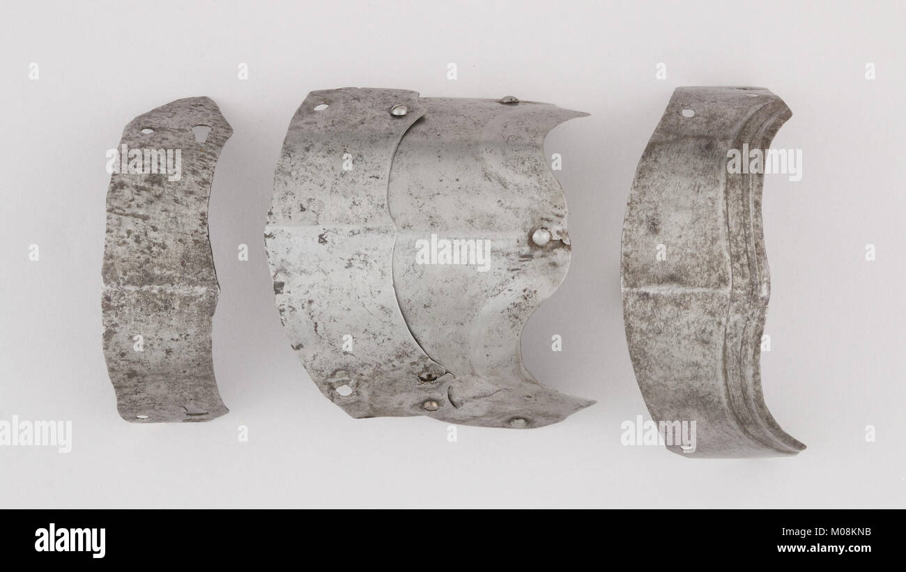 A knee defense (poleyn) used in medieval armor, designed to protect the ...