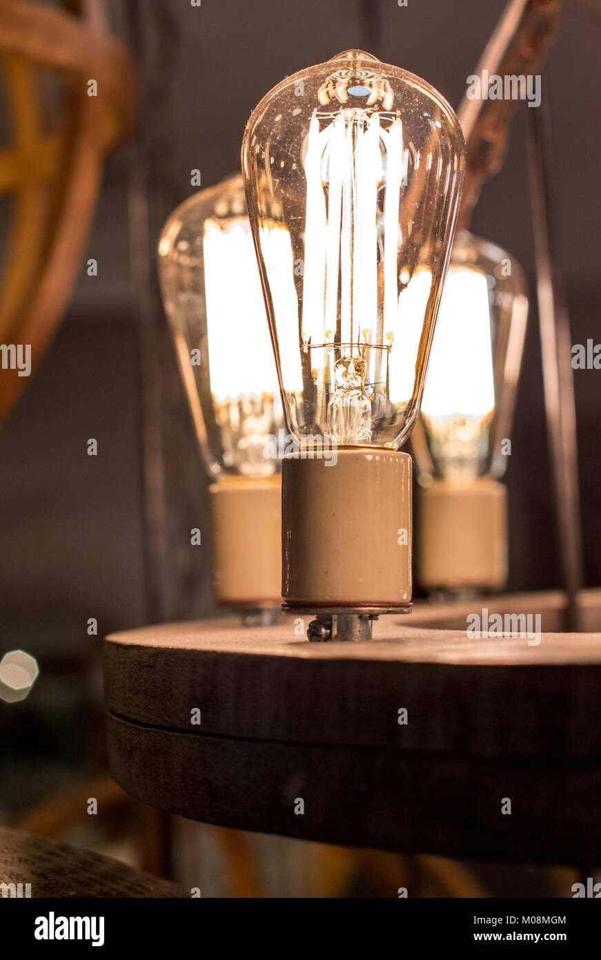 A classic Edison light bulb on black background Stock Photo - Alamy