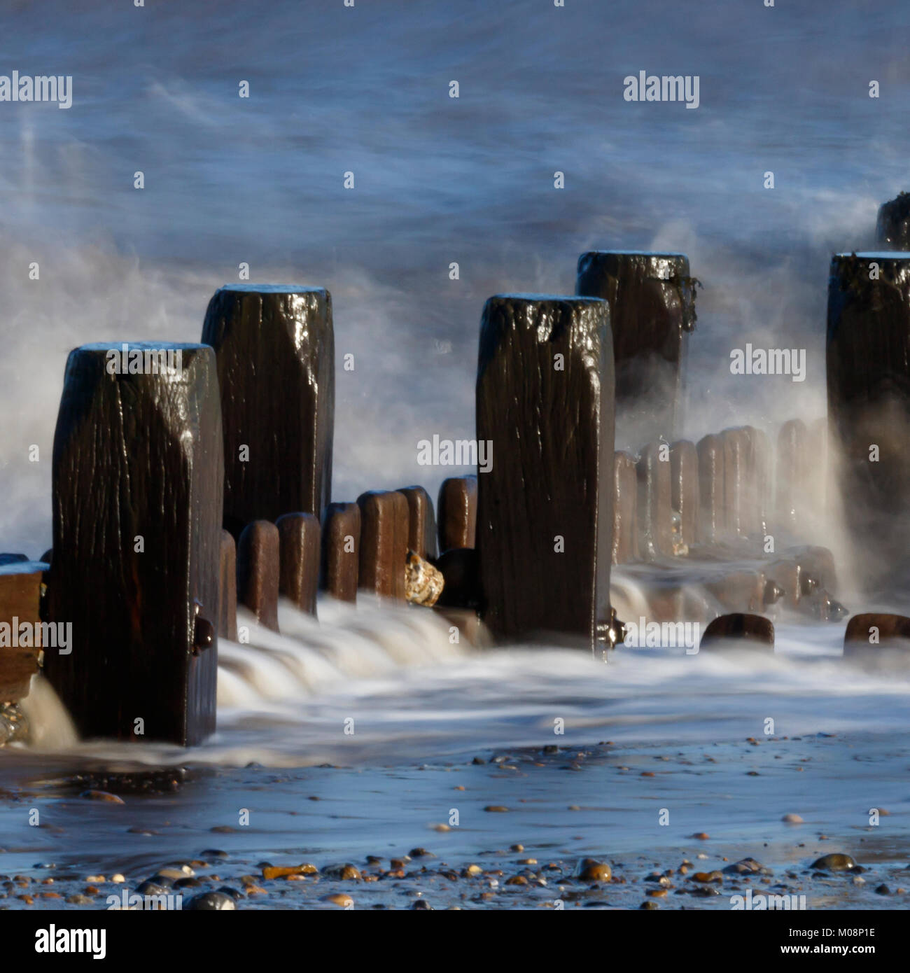 Breaking waves in slow motion - artistic effect Stock Photo - Alamy