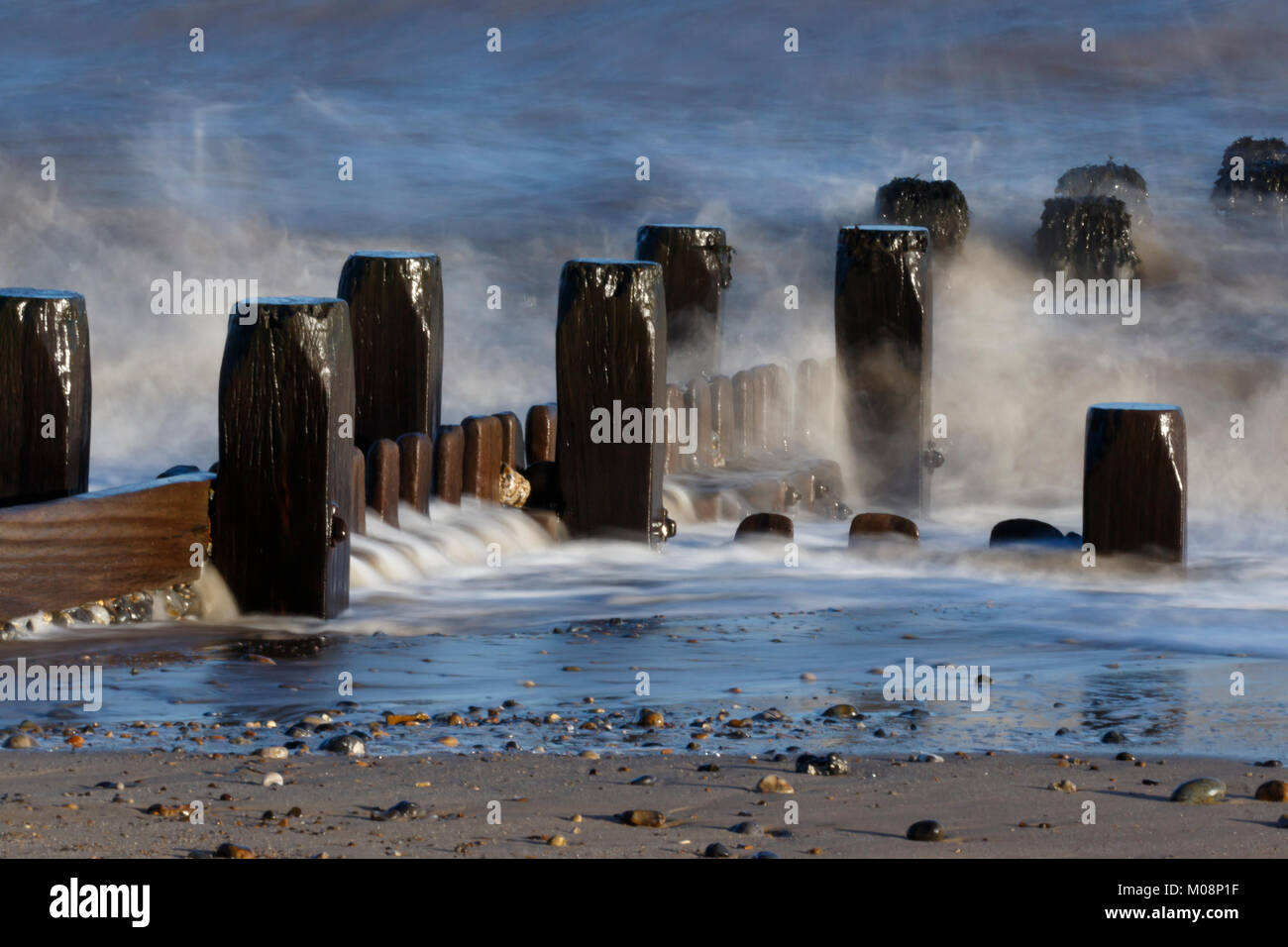 Breaking waves in slow motion - artistic effect Stock Photo - Alamy