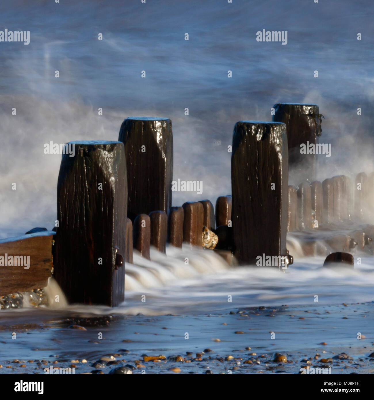 Breaking waves in slow motion - artistic effect Stock Photo - Alamy