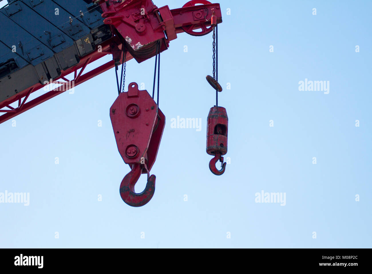 Big and small hook with crane Stock Photo - Alamy
