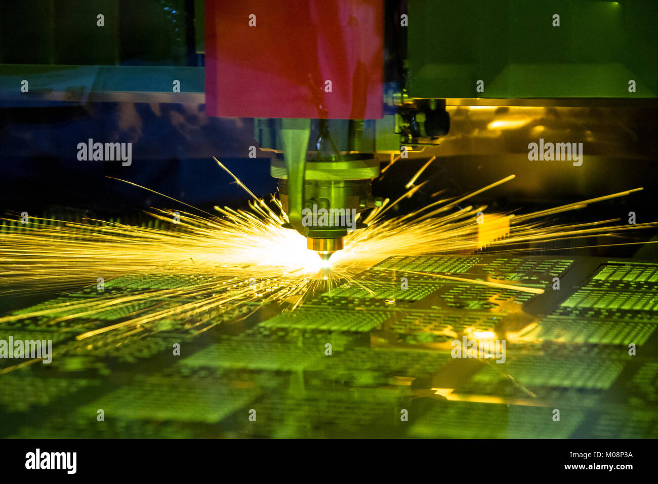 Head of CNC laser cutiing machine with sparking beam behine Safety ...