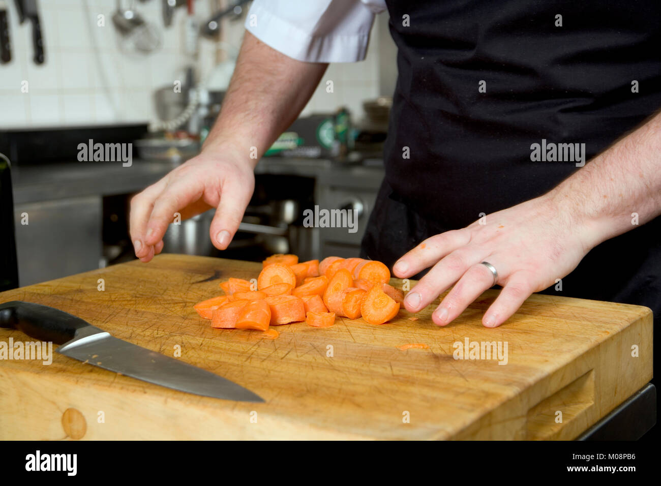 Professional chef at work in a restaurant kitchen Stock Photo - Alamy