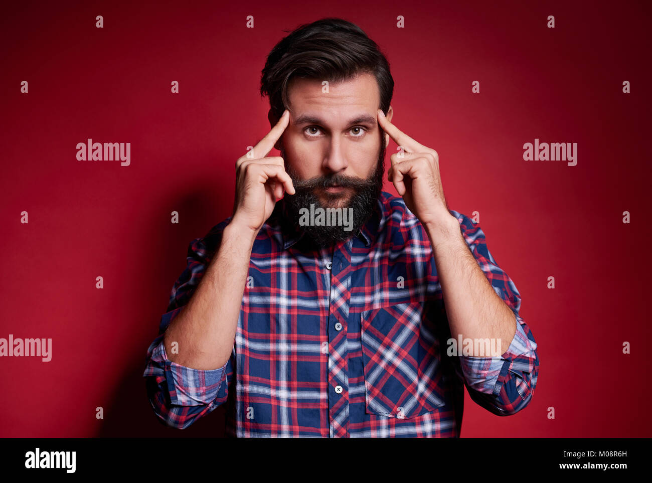 Portrait thinking businessman posing hi-res stock photography and ...
