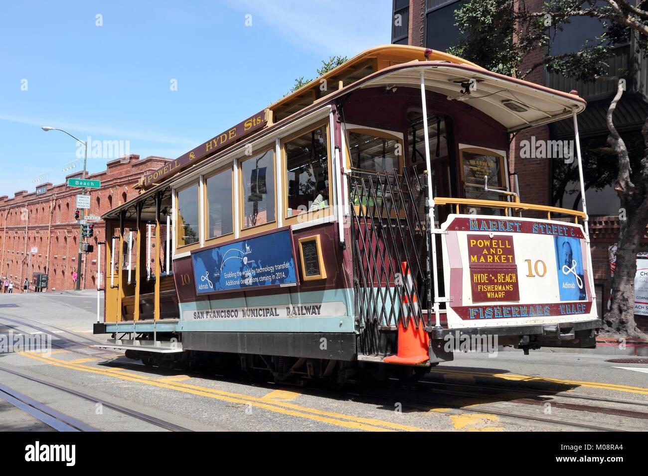 SAN FRANCISCO, USA - APRIL 8, 2014: People ride historic cable car in ...