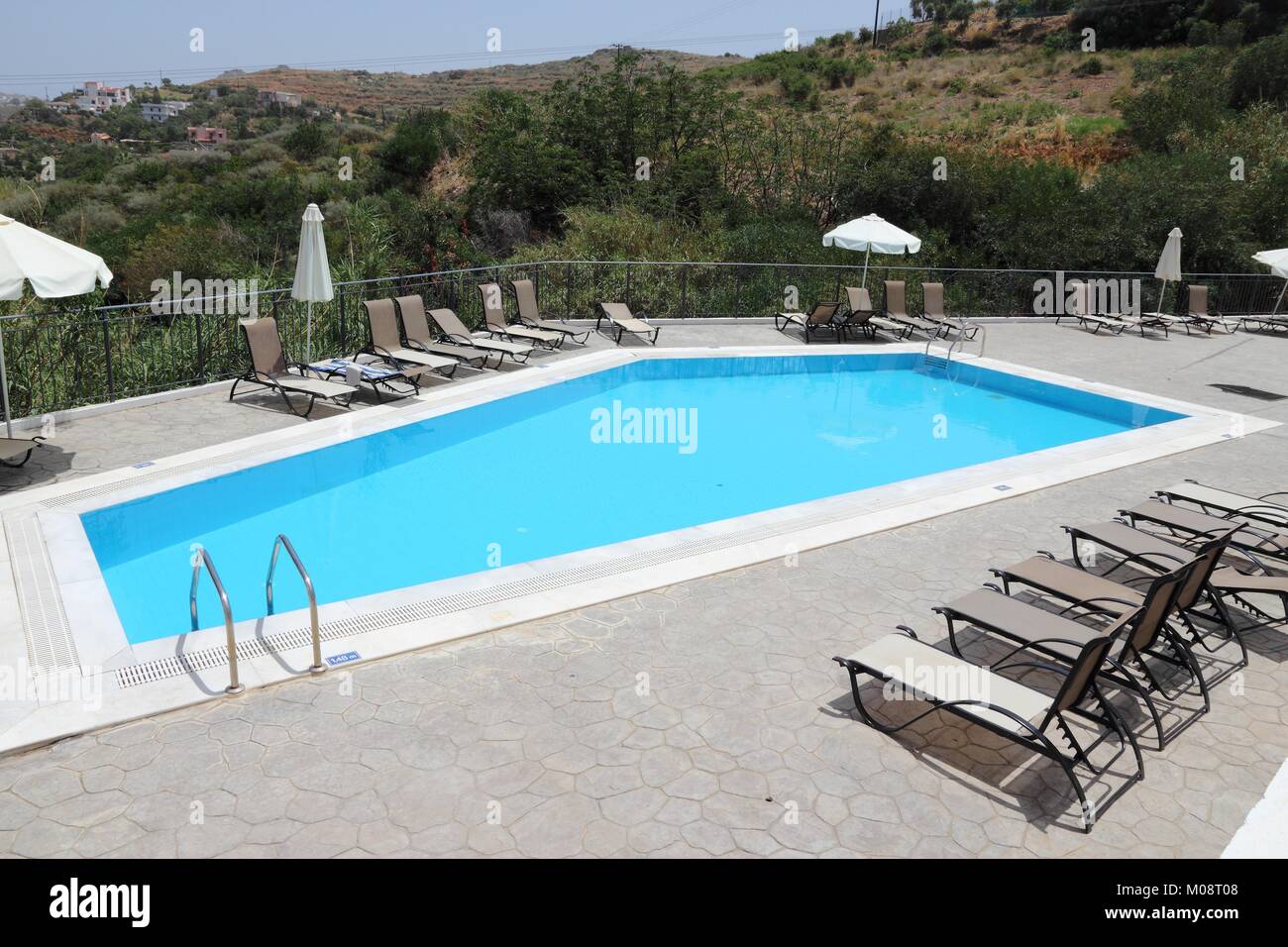 Generic vacation resort in Crete island in Greece. Swimming pool sun ...