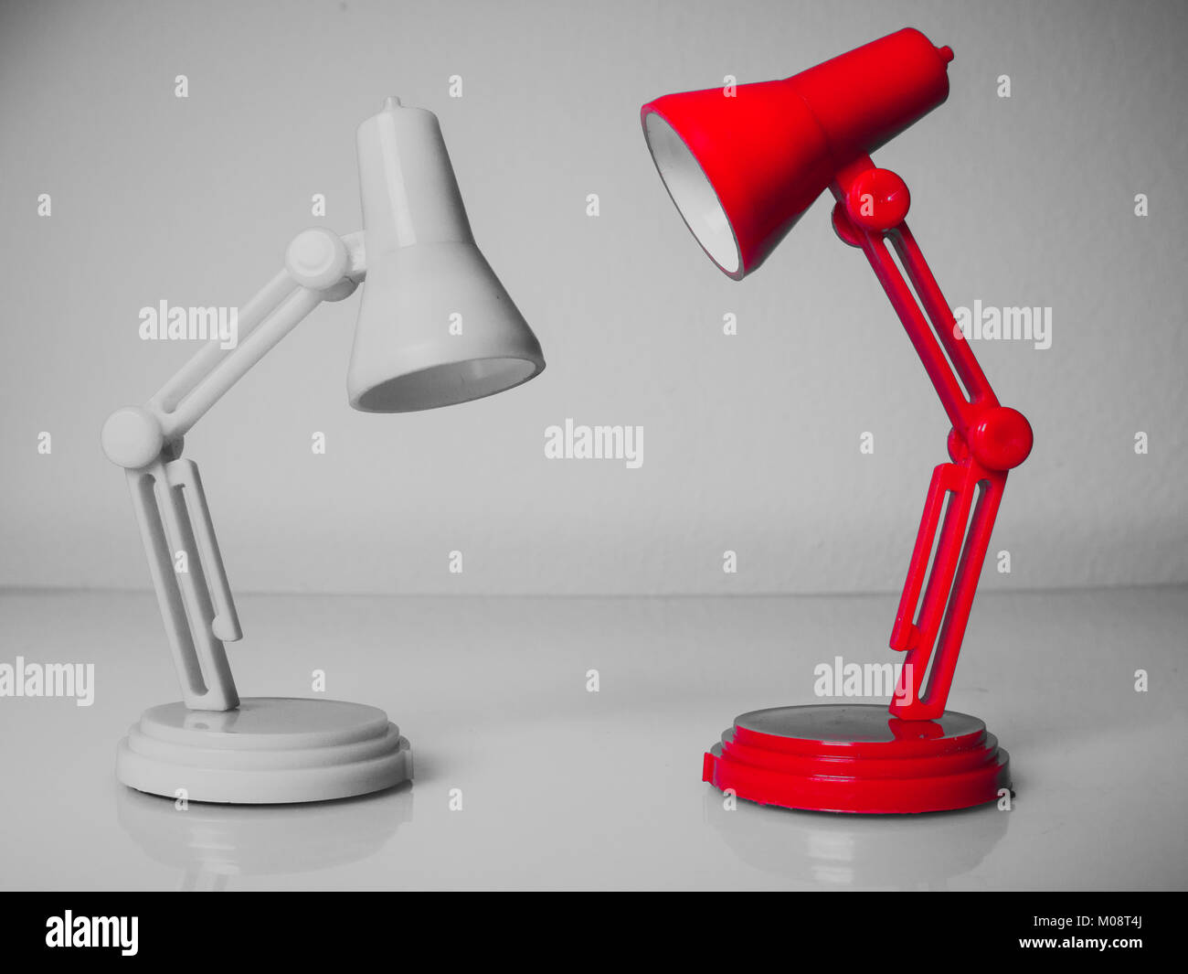 Two table lamps. Vintage red desk lamp Stock Photo - Alamy