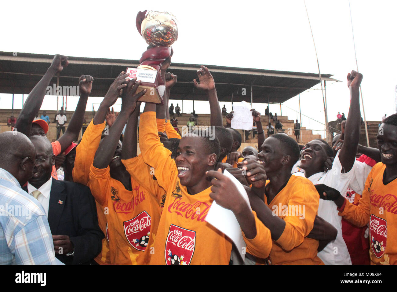 A Ugandan soccer team players jubilate up on victory Stock Photo - Alamy