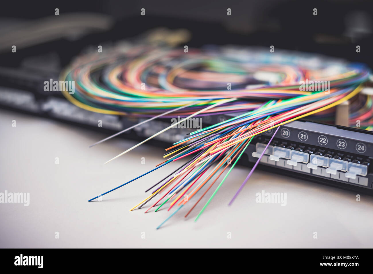 Fibre optic cables on top of patch distribution panel shelf for ...