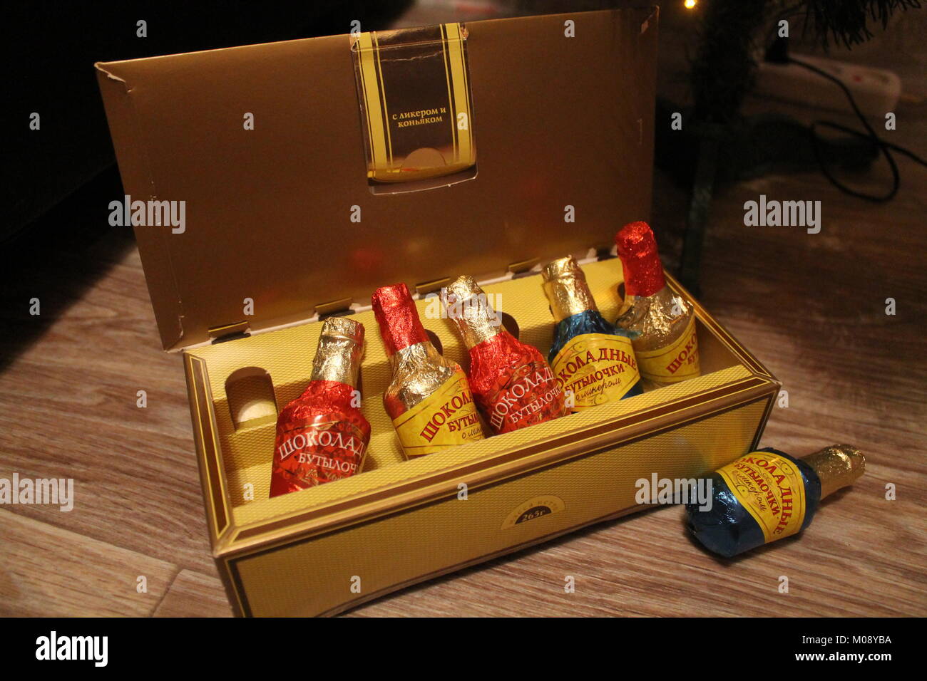 colorful bright chocolate bottles with brandy inside sweet present and ...