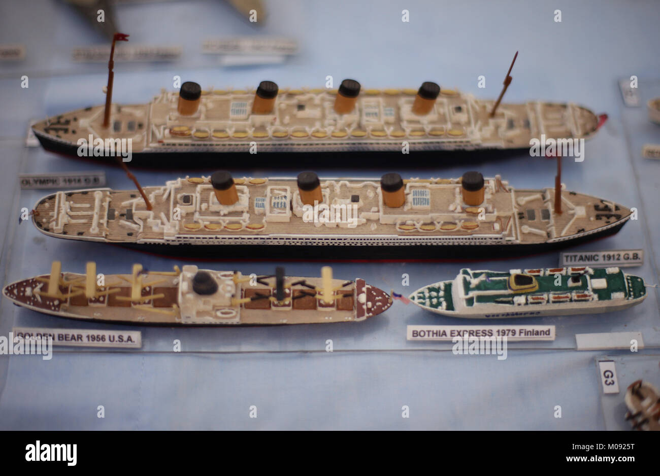 A model of the Titanic (middle row) on display amongst war and merchant ...
