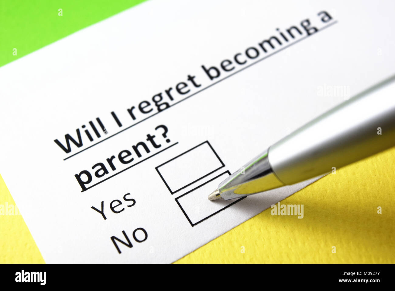 Will i regret becoming a parent? yes or no Stock Photo - Alamy