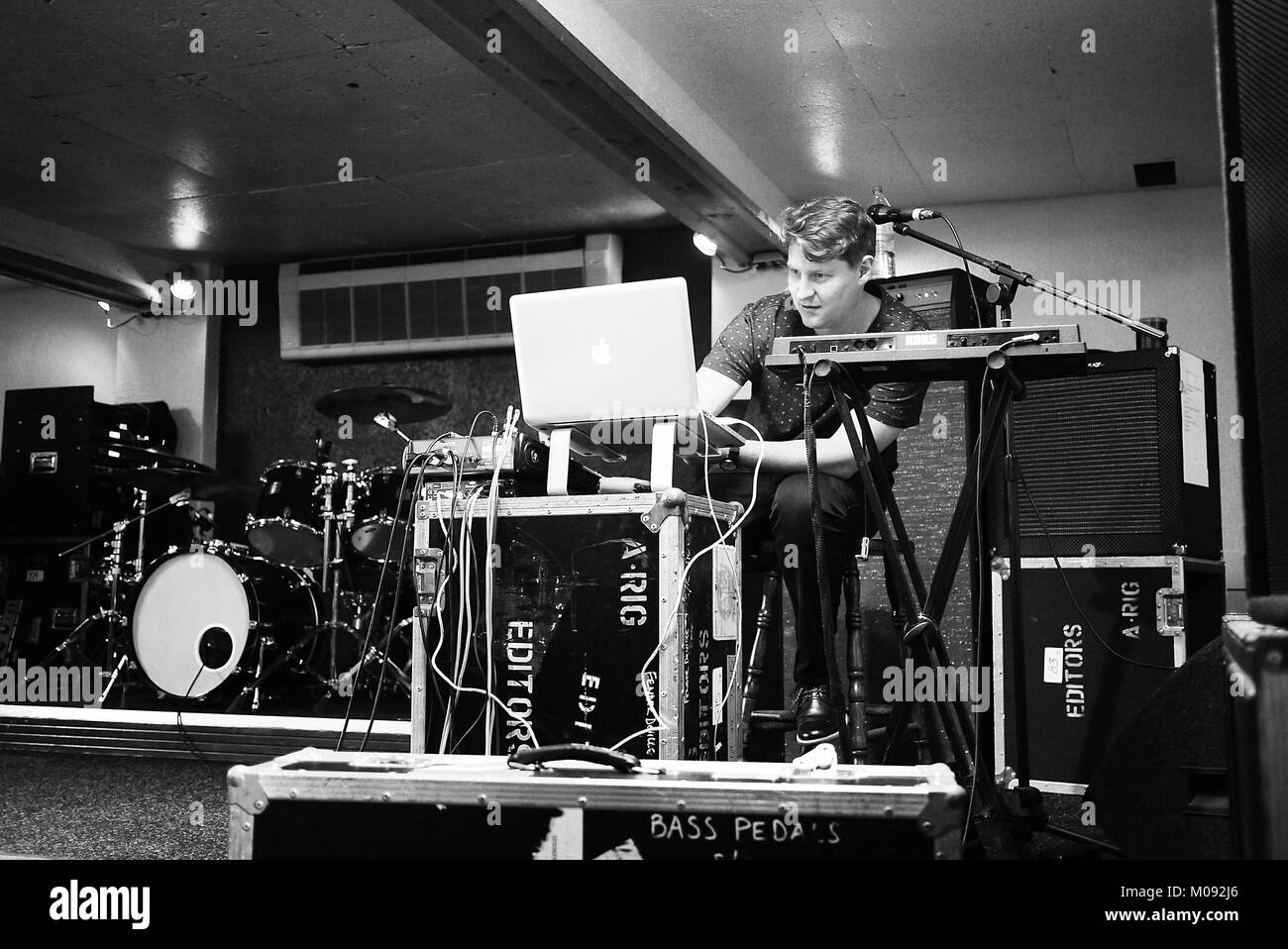 The musicians from the British post-punk band Editors gather for a ...