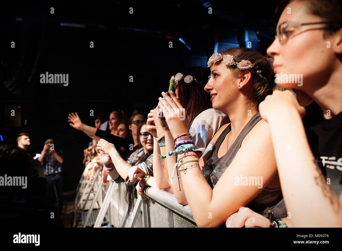 A fan of the German rapper Casper looks happy watching the popular ...