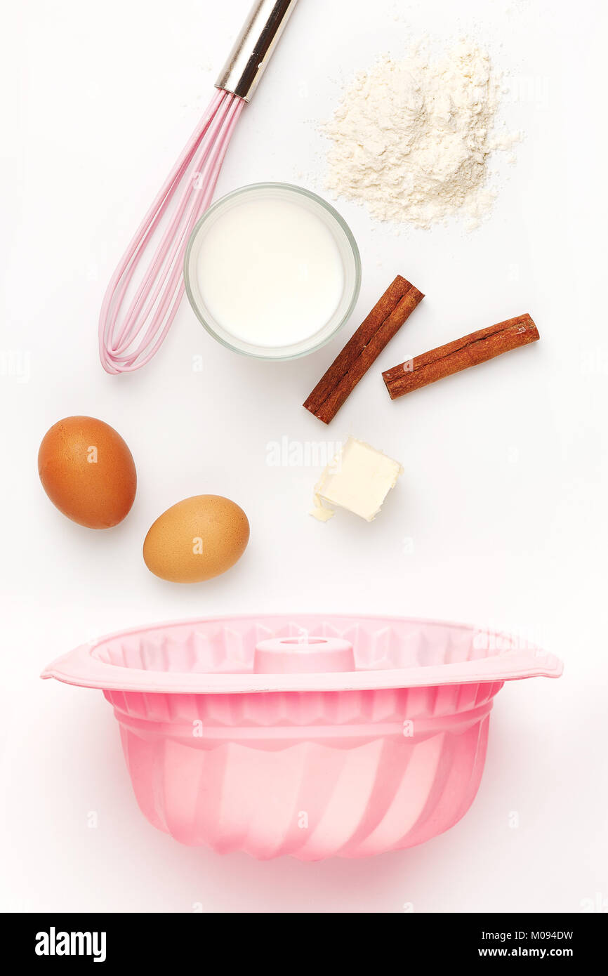 The falling ingredients of pie or cake on white background Stock Photo ...