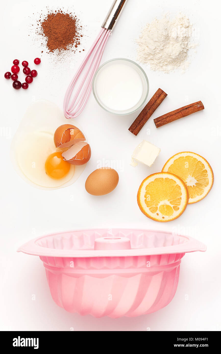 The falling ingredients of pie or cake on white background Stock Photo ...