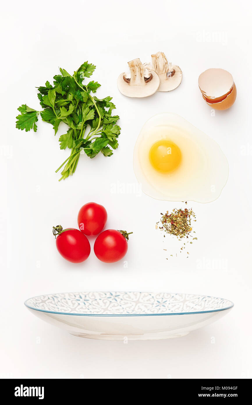 The falling ingredients of fried egg. Healthy breakfast ingredients ...