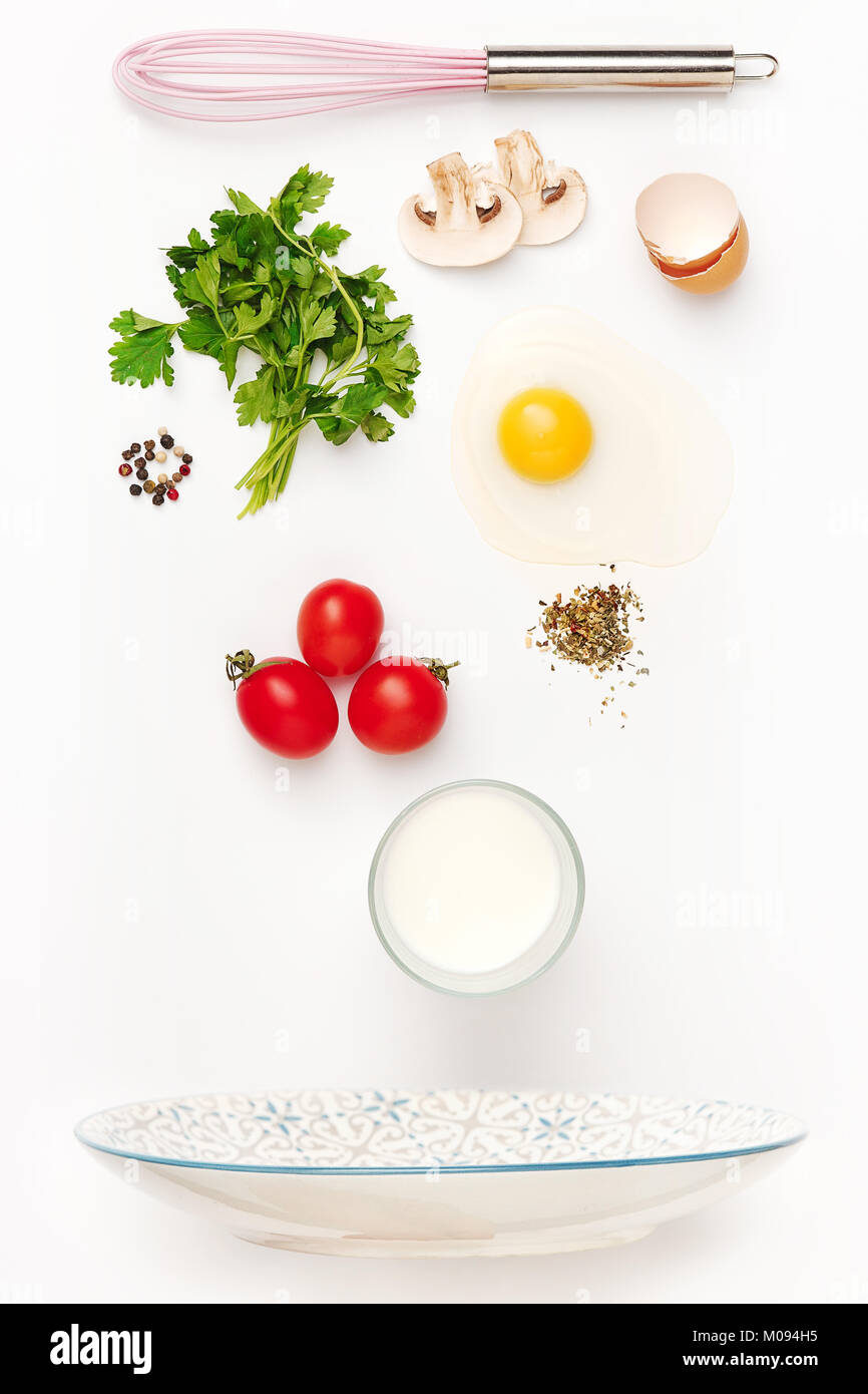 The falling ingredients of fried egg. Healthy breakfast ingredients ...