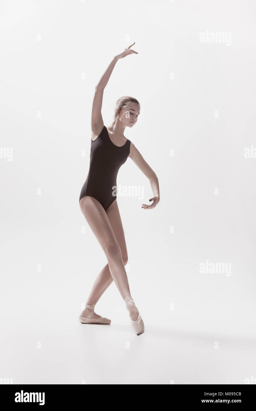 Young classical dancer isolated on white background Stock Photo - Alamy