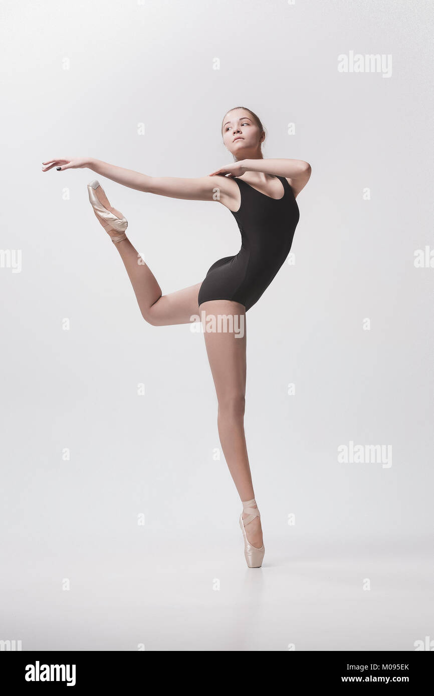 Young classical dancer isolated on white background Stock Photo - Alamy