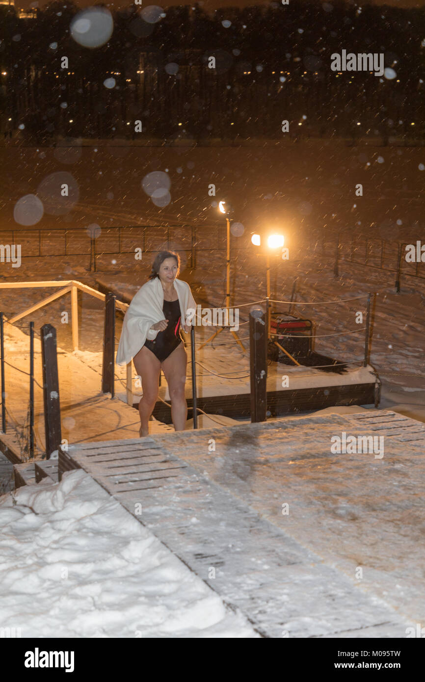 Bathing in the ice hole at Epiphany Stock Photo - Alamy