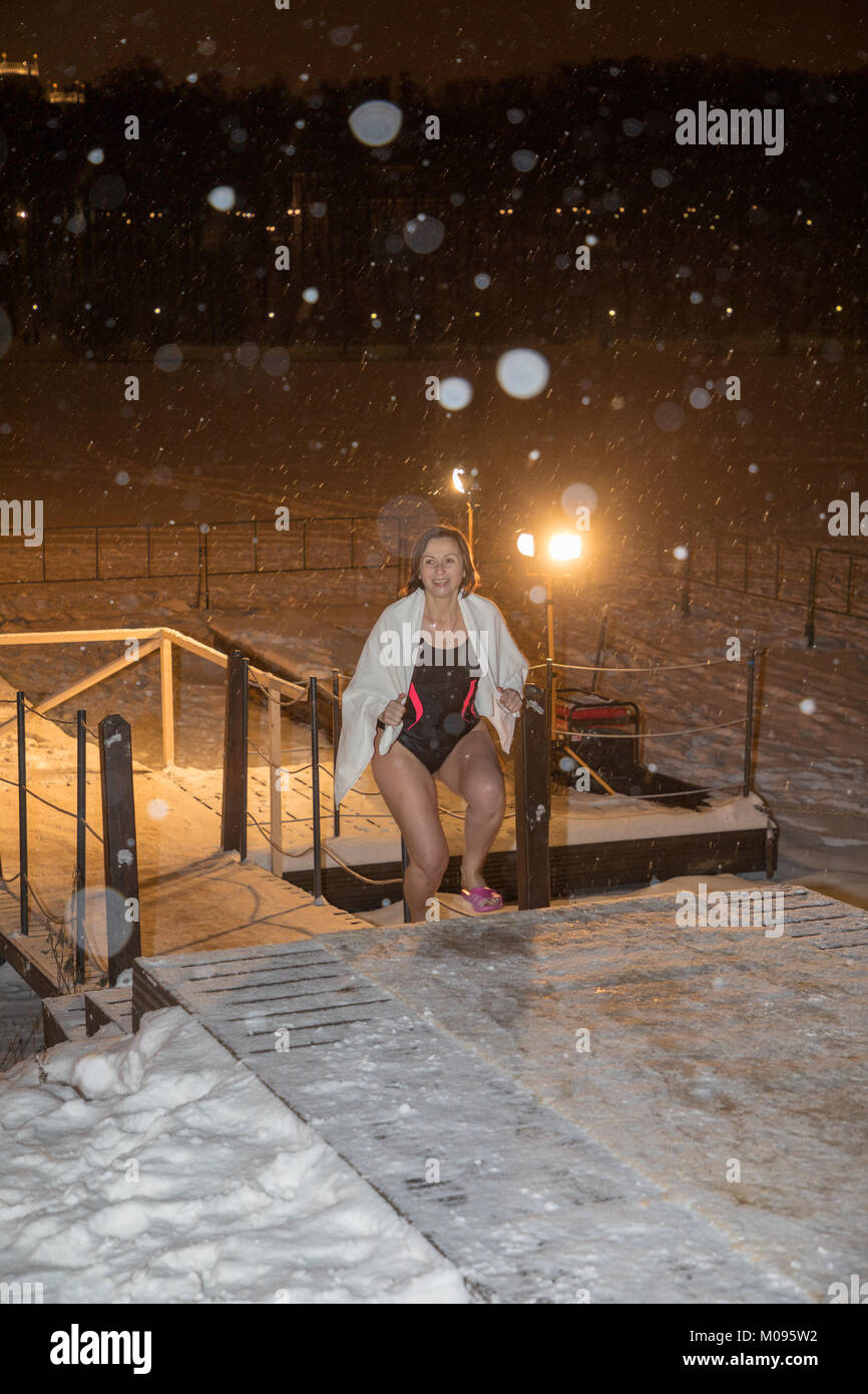 Bathing in the ice hole at Epiphany Stock Photo - Alamy
