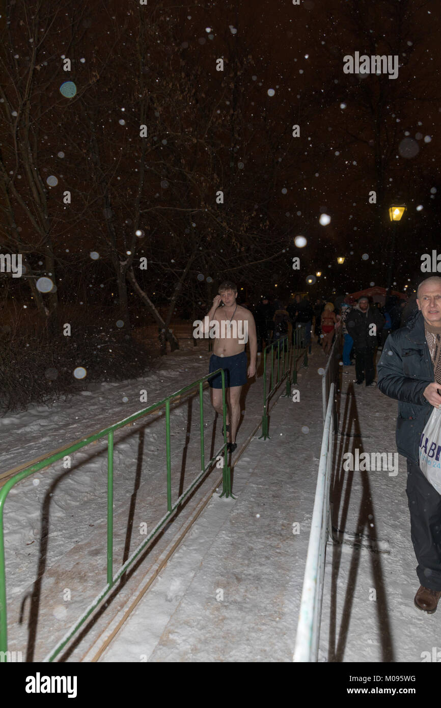 Bathing in the ice hole at Epiphany Stock Photo - Alamy