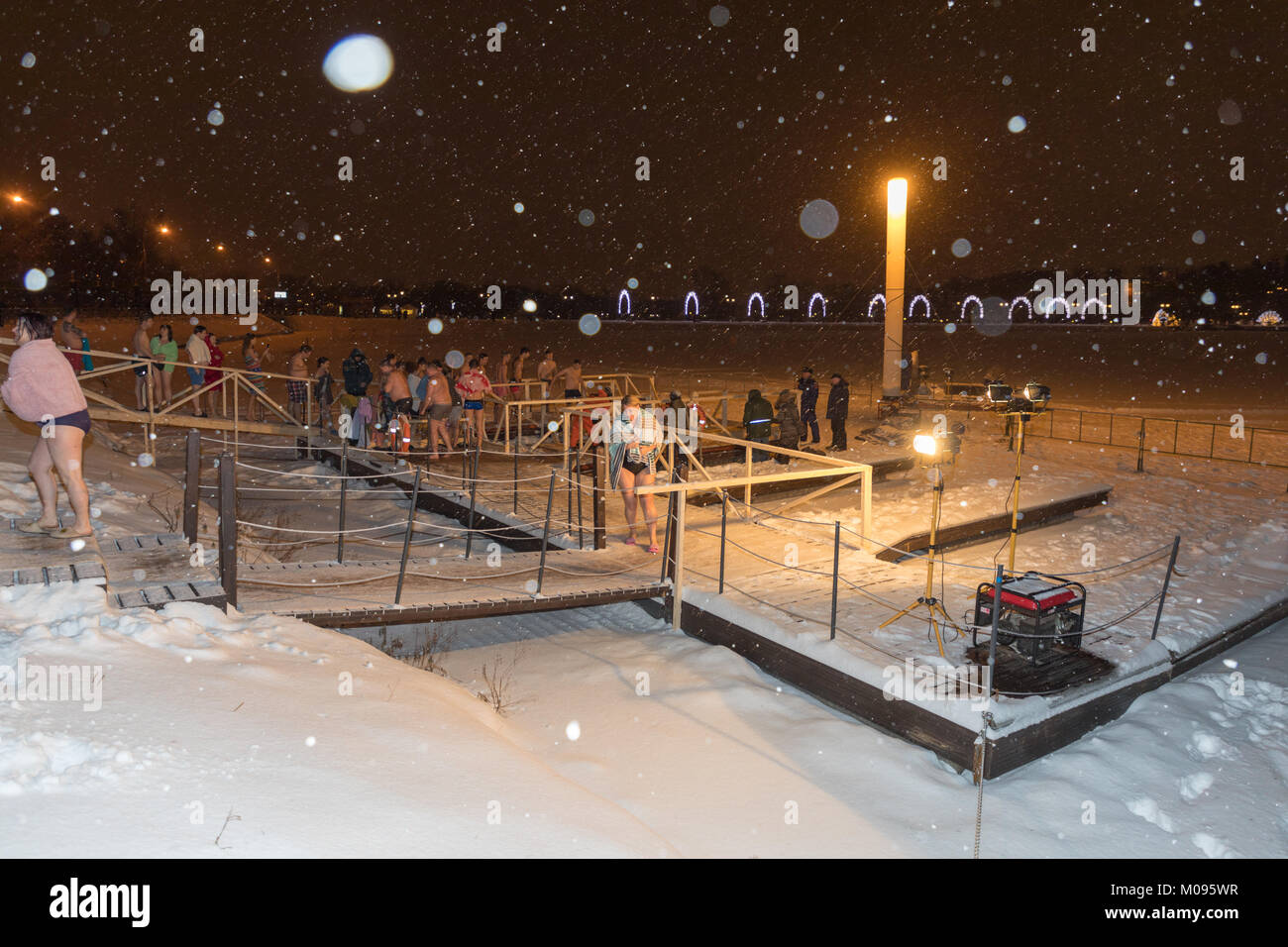 Bathing in the ice hole at Epiphany Stock Photo - Alamy