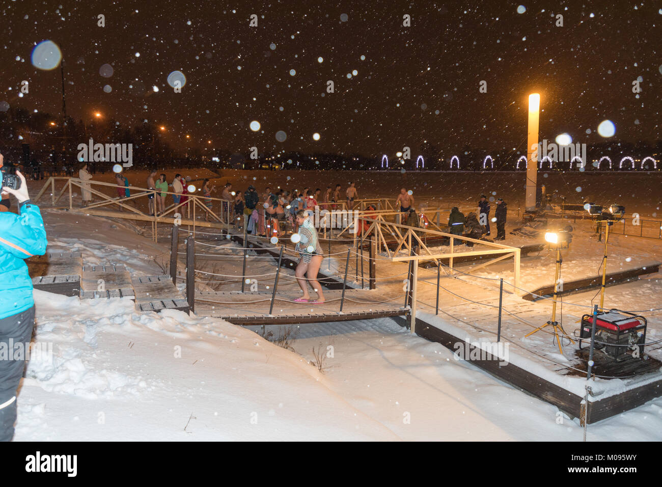 Bathing in the ice hole at Epiphany Stock Photo - Alamy